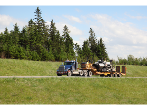 How to Transport Heavy Machinery Into Canada: Rail Transport vs. Heavy ...